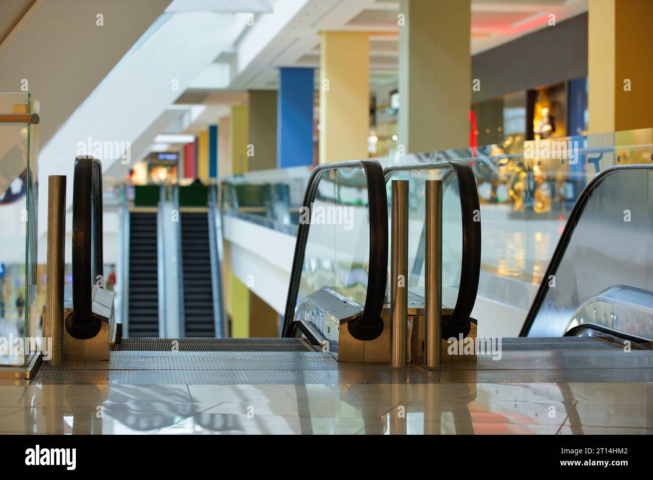 escalator and empty modern shopping mall interior Stock Photo - Alamy