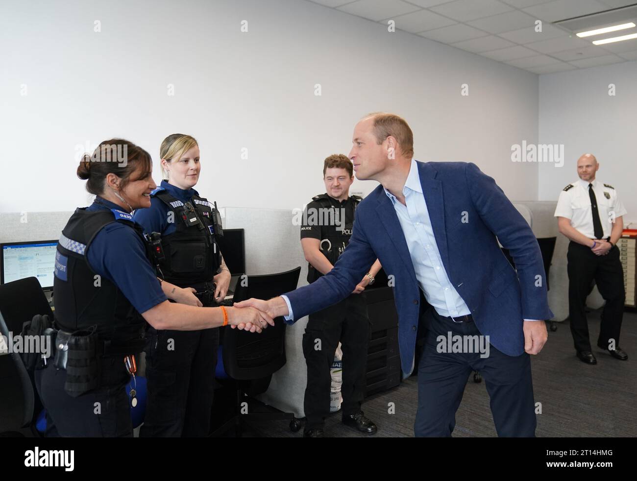 The Prince of Wales talking to staff during a visit to the Milton ...