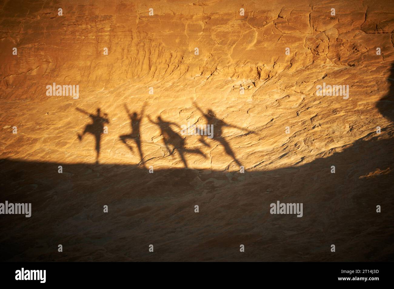 Dancing shadows on the rock in the desert Stock Photo - Alamy