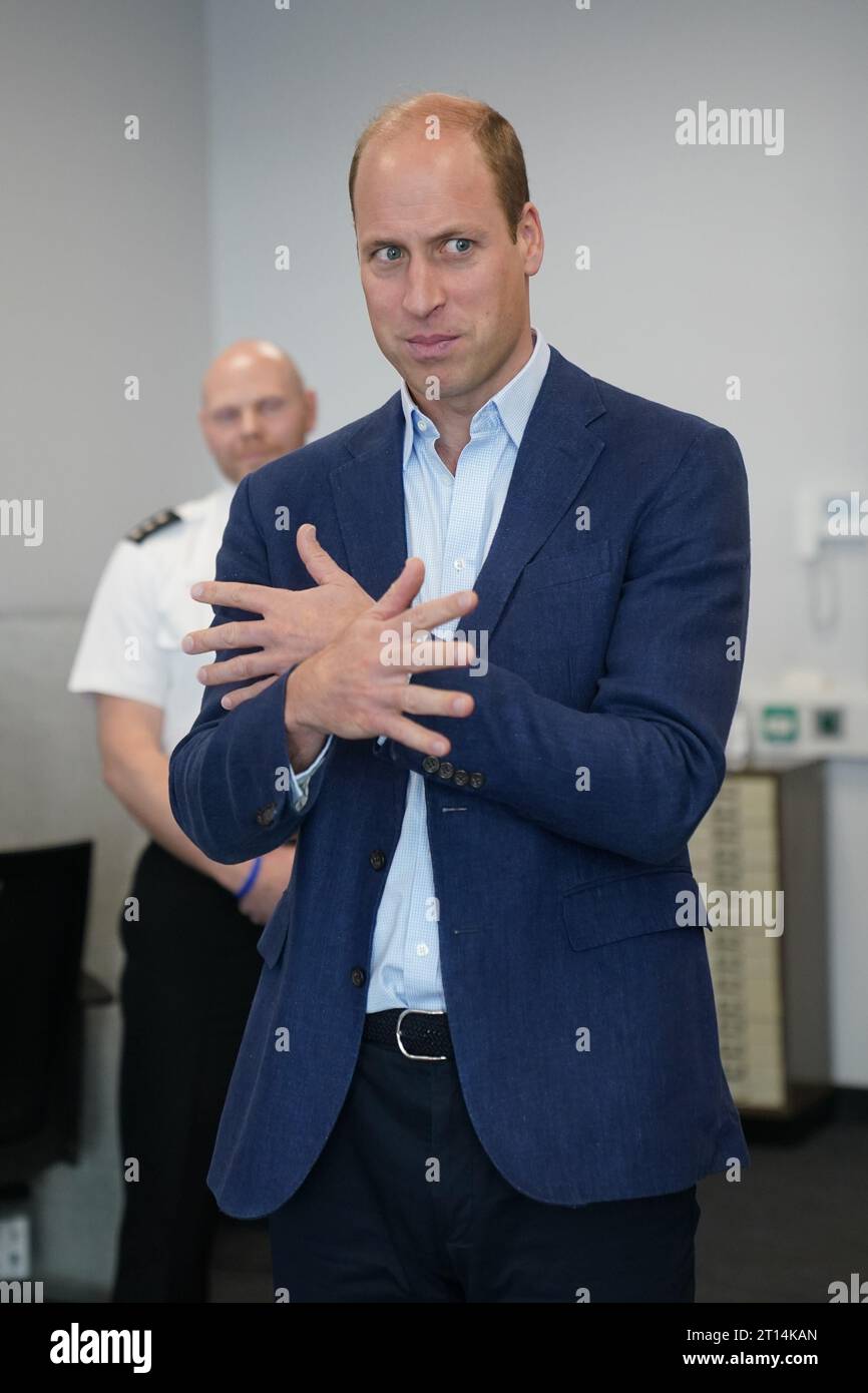 The Prince of Wales talking to staff during a visit to the Milton ...