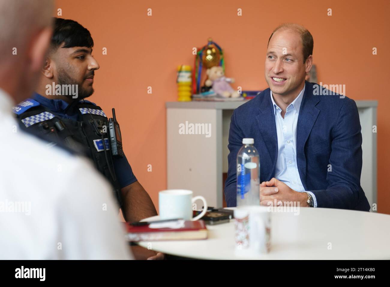 The Prince of Wales talking to staff during a visit to the Milton ...