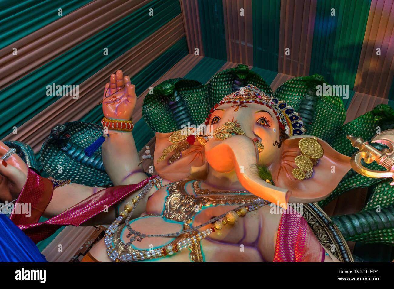 A beautiful idol of Lord Ganesha being worshipped at a mandal in Mumbai ...