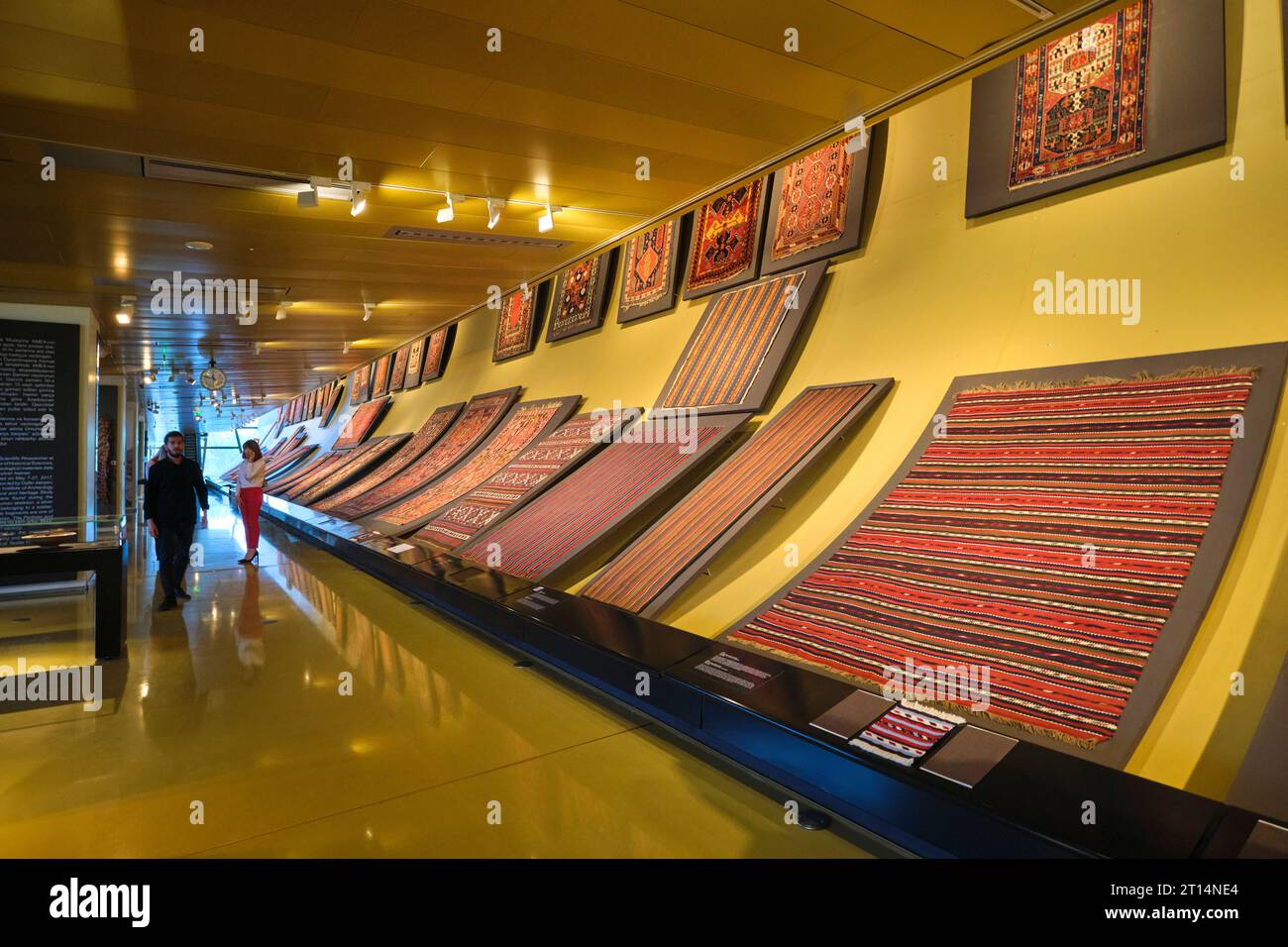 Interior view in the display galleries of various red carpets, textiles ...