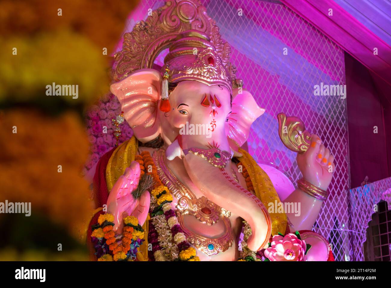 A beautiful idol of Lord Ganesha being worshipped at a mandal in Mumbai ...