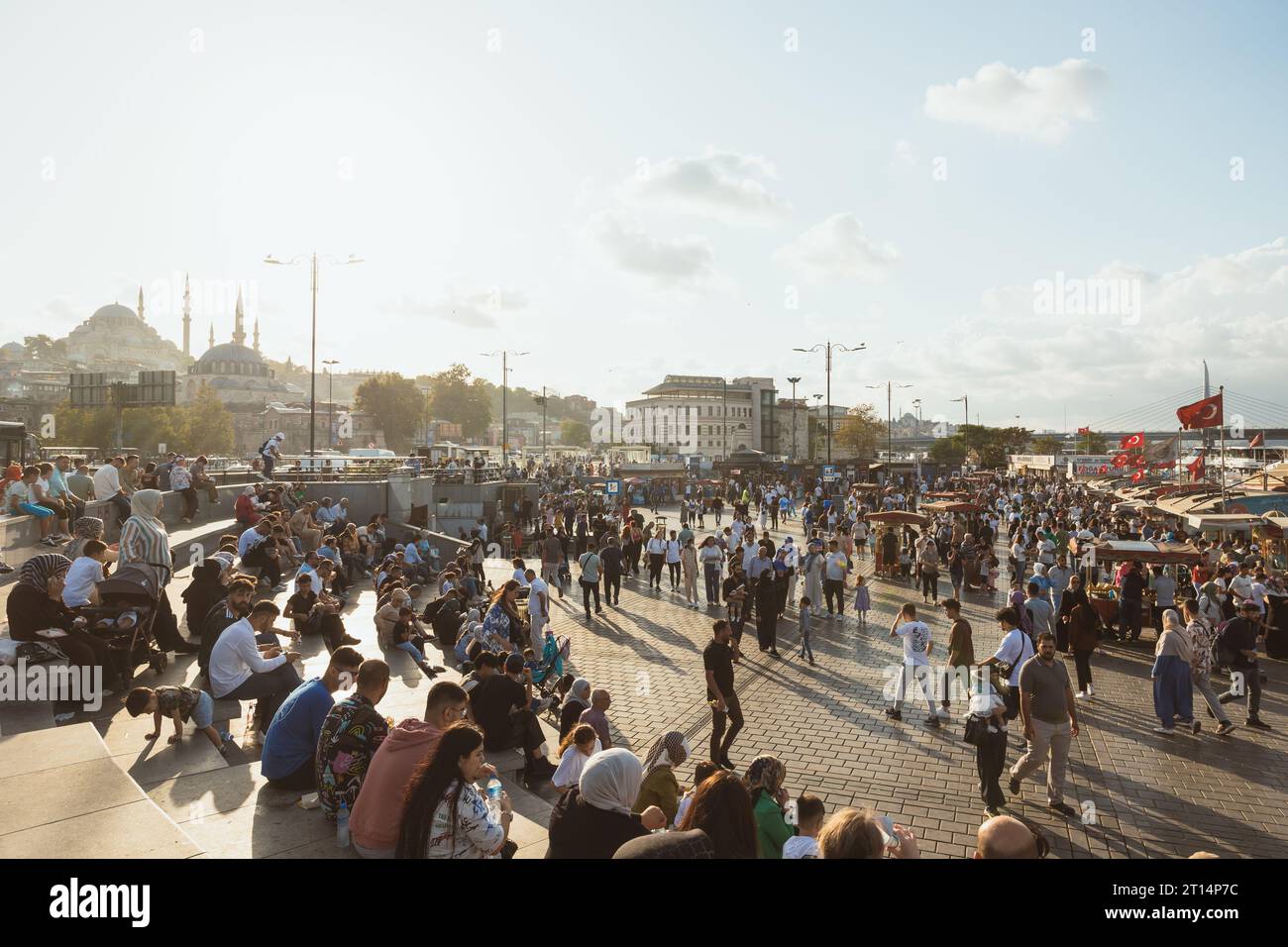 People or tourists in Eminonu Square and cityscape of Istanbul on the ...