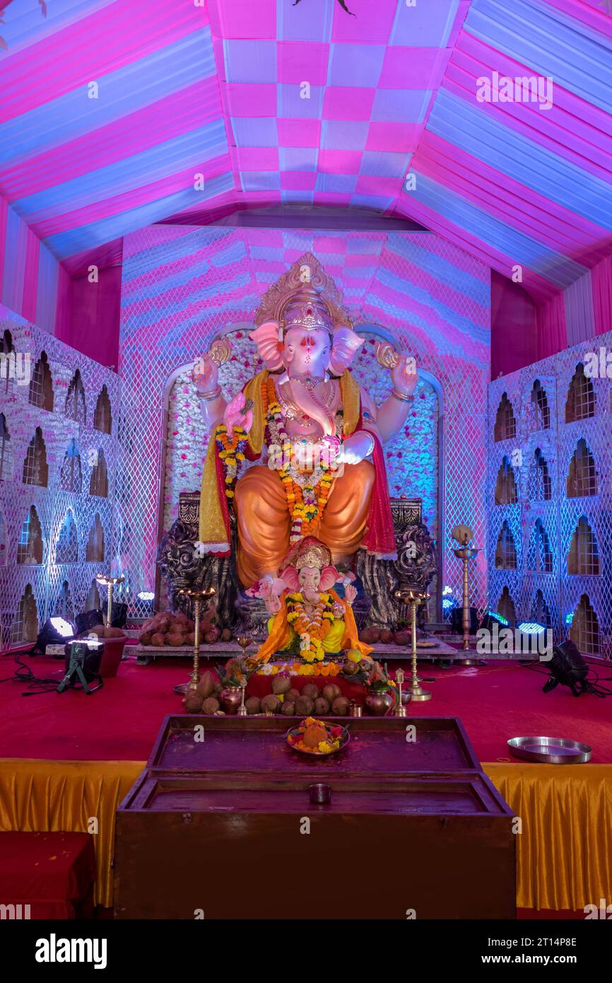 A beautiful idol of Lord Ganesha being worshipped at a mandal in Mumbai ...