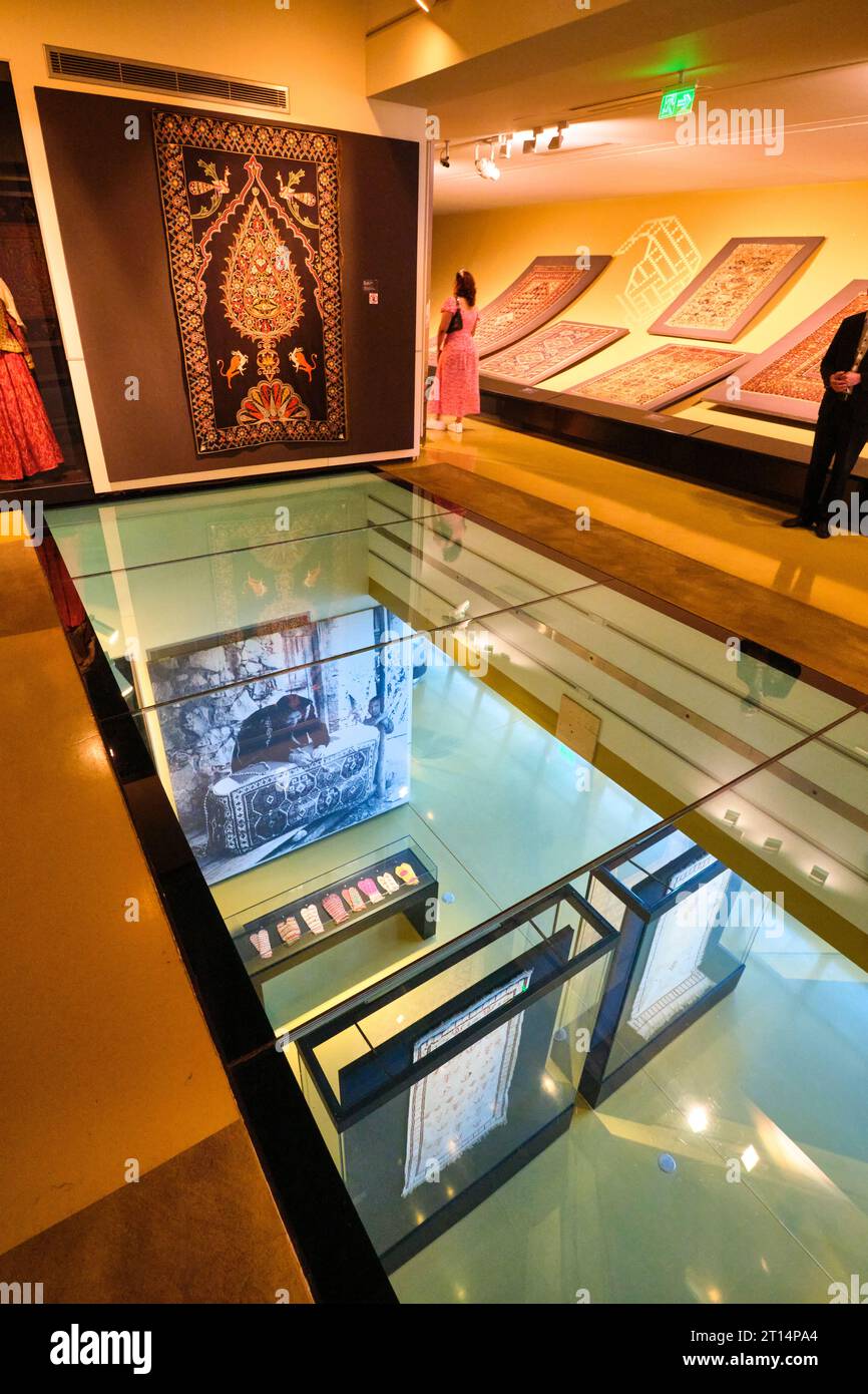 Interior view in the display galleries of various carpets and historic ...