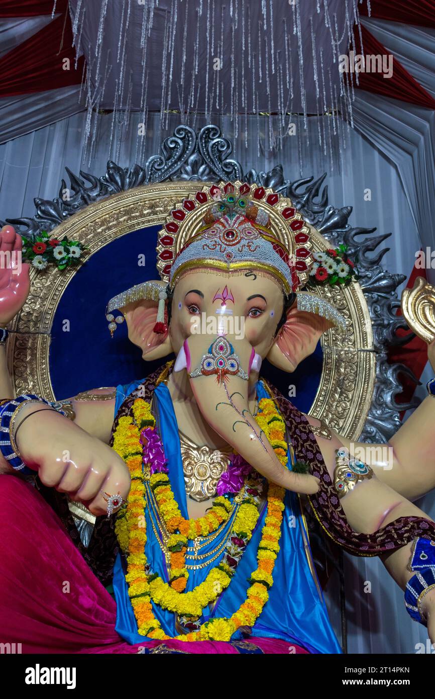 A beautiful idol of Lord Ganesha being worshipped at a mandal in Mumbai ...