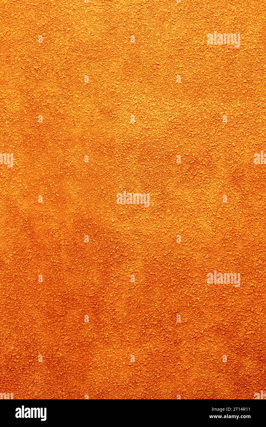 rough wall painted in orange color shows a beautiful background Stock ...
