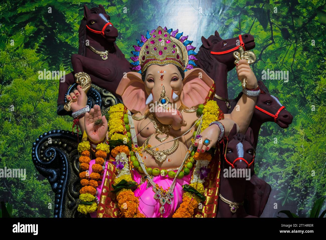 A beautiful idol of Lord Ganesha being worshipped at a mandal in Mumbai ...