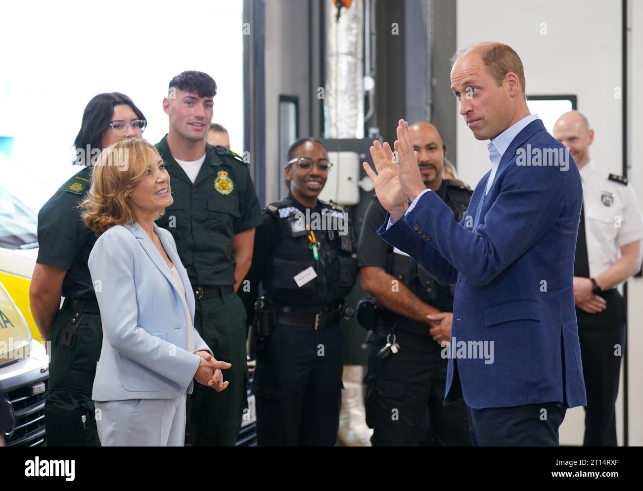 The Prince of Wales, with Dr Sian Williams, talking to staff during a ...