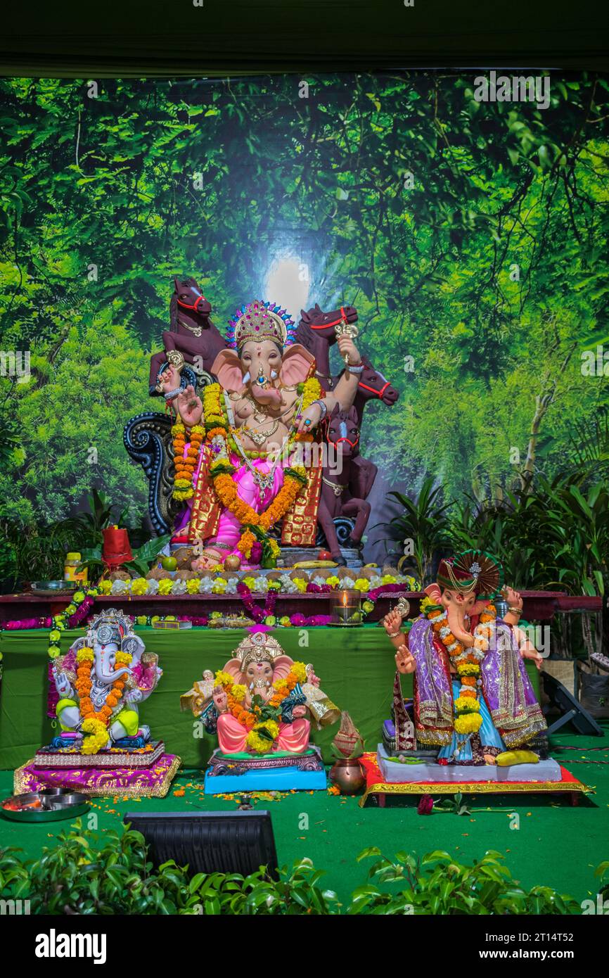 A beautiful idol of Lord Ganesha being worshipped at a mandal in Mumbai ...