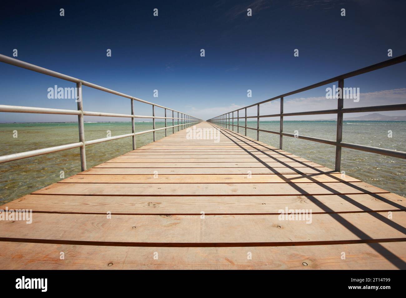 Long wooden jetty on the Red Sea. Pontoon jetty. Egypt Stock Photo - Alamy