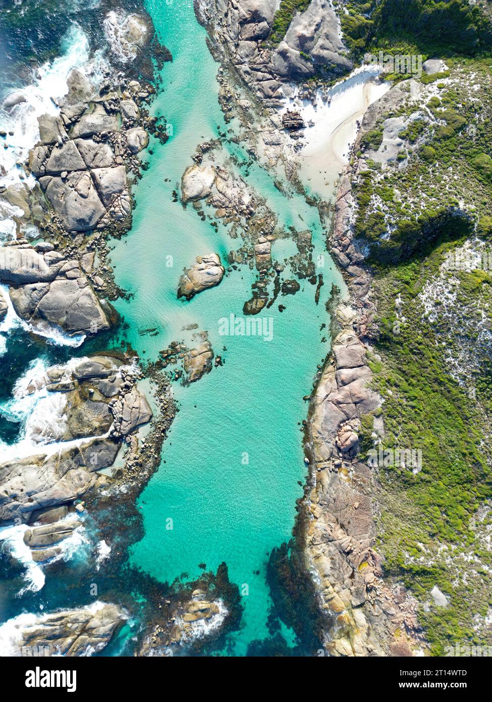 An aerial view of a shore with teal waters in Denmark, Great Southern ...