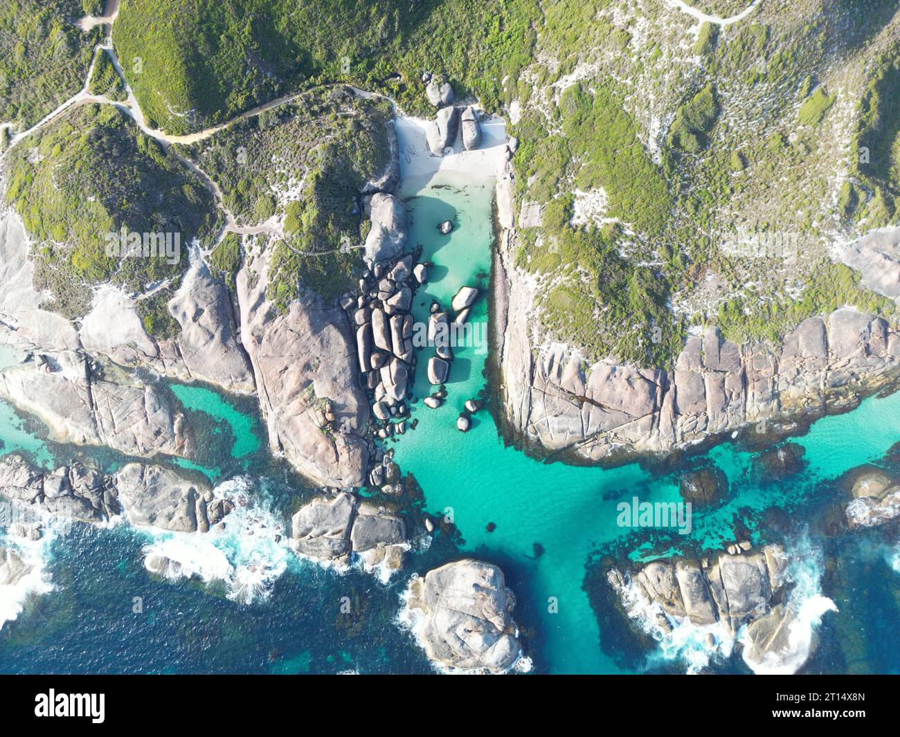 An aerial view of a shore with teal waters in Denmark, Great Southern ...