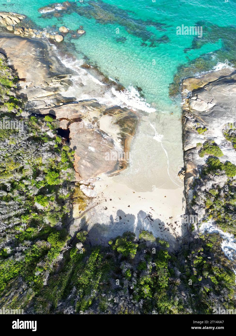 An aerial view of a shore with teal waters in Denmark, Great Southern ...