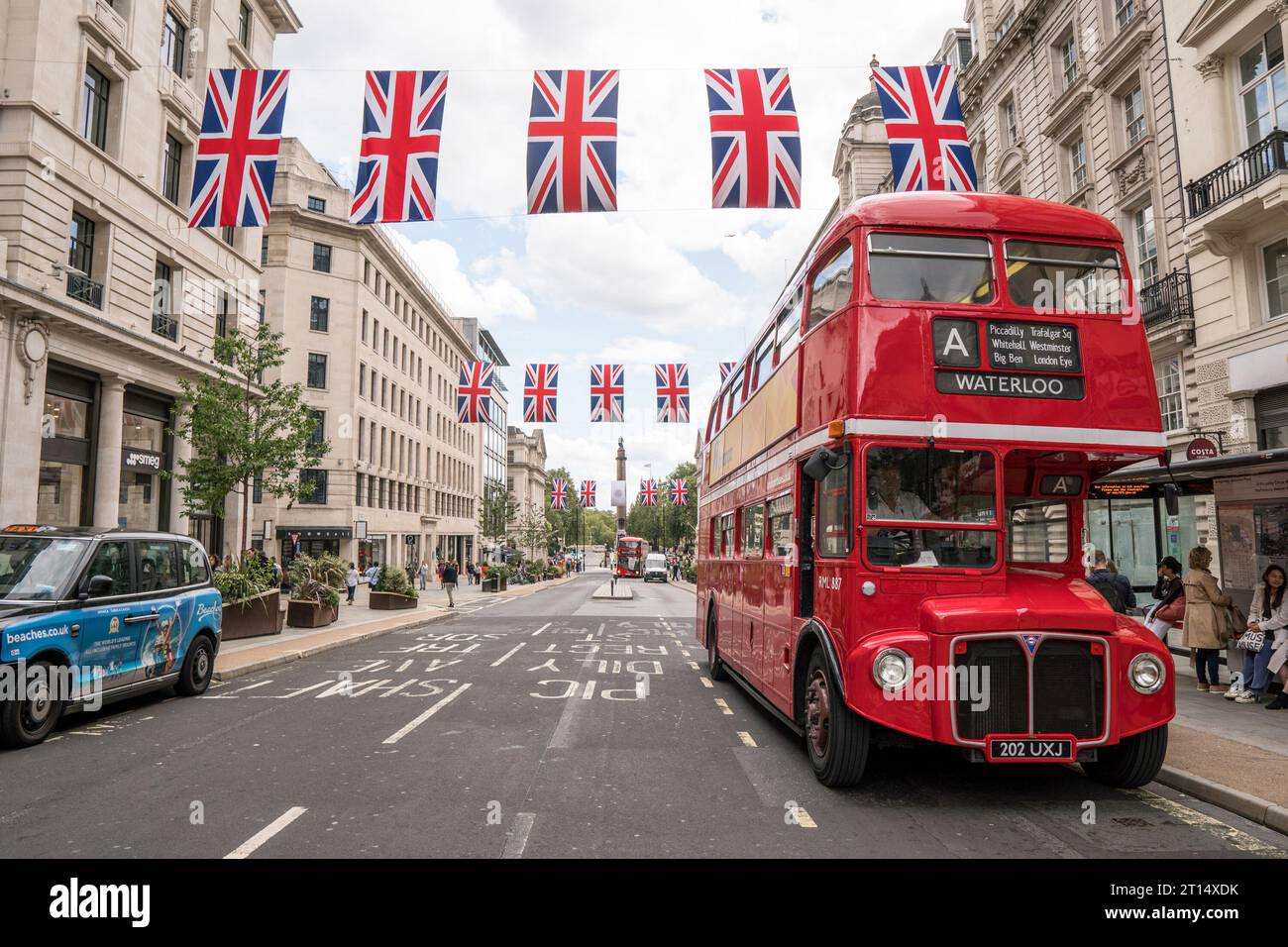 The iconic red Routemaster double decker bus on Regents Street London ...