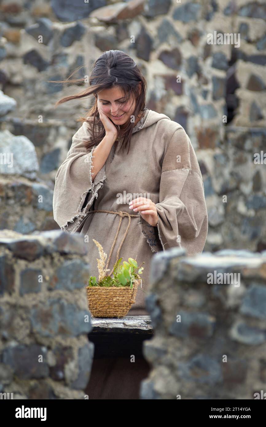 Medieval woman joyful at a castle Stock Photo - Alamy