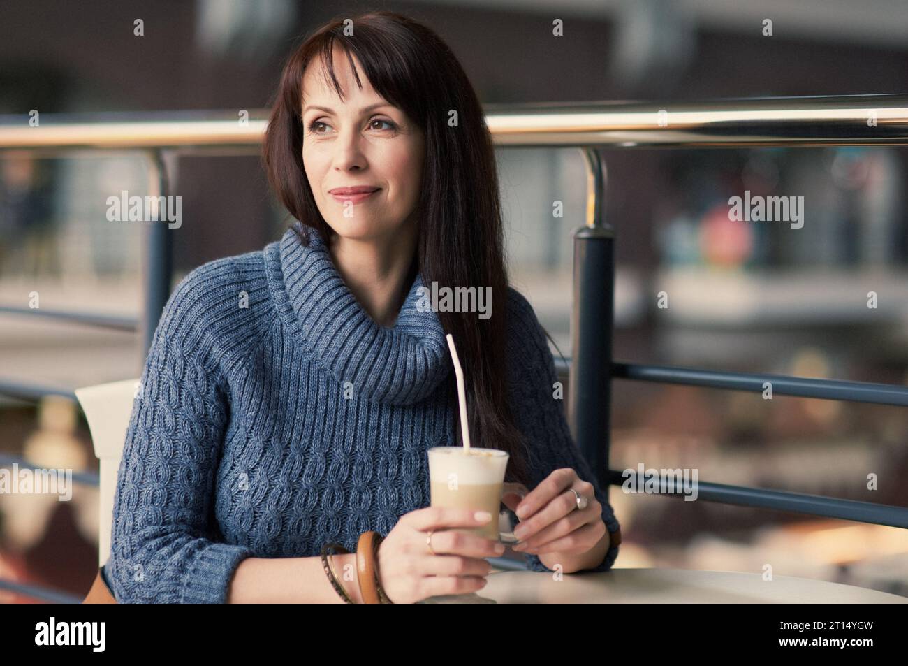 happy lonely woman drinking coffee in cafe Stock Photo - Alamy
