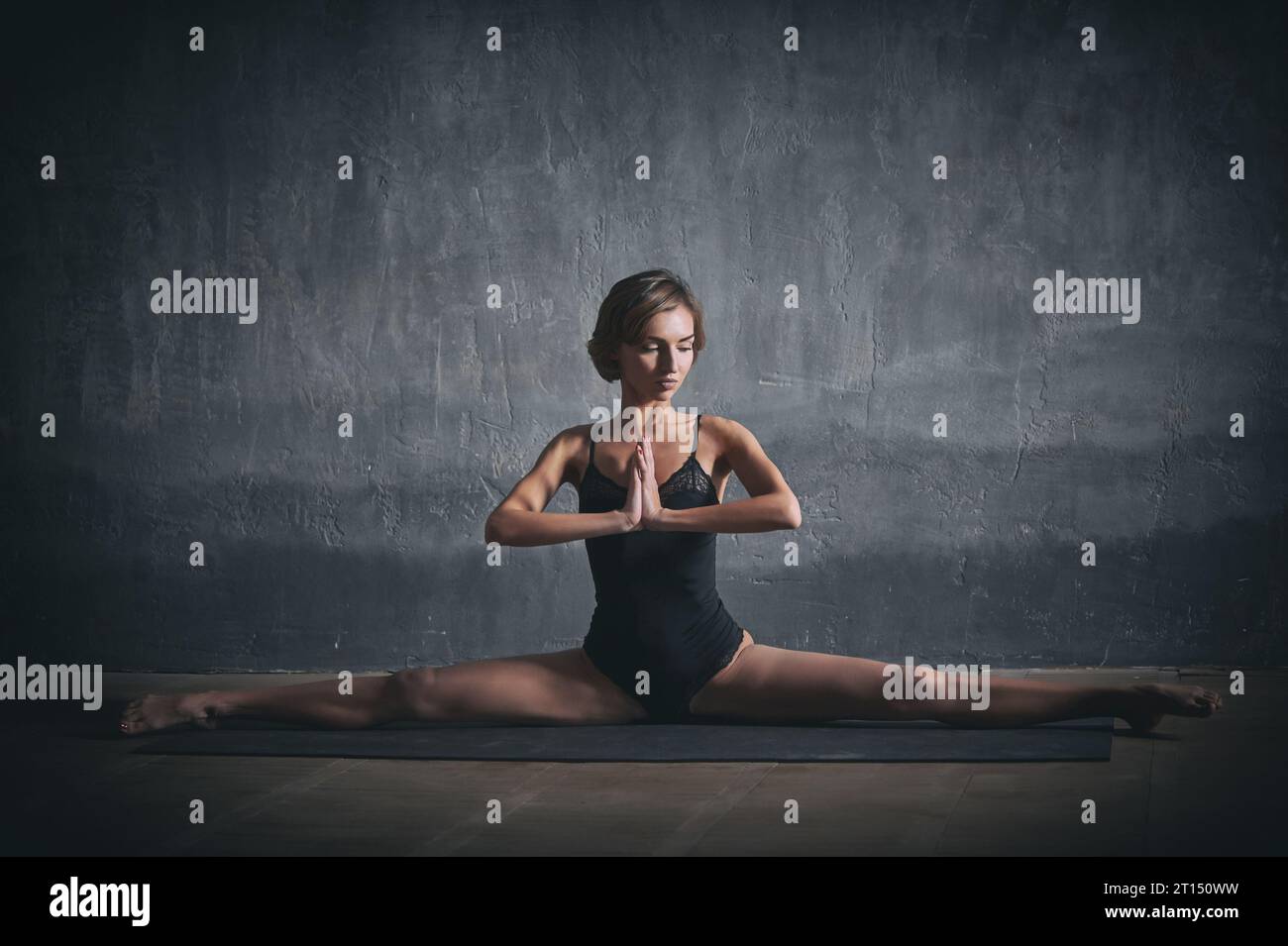 Beautiful sporty fit yogini woman practices yoga asana Samakonasana in ...