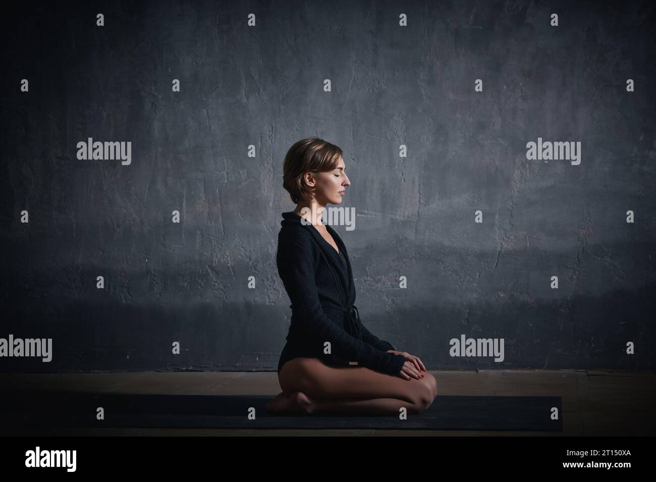 Beautiful sporty fit yogini woman practices yoga asana Vajrasana ...