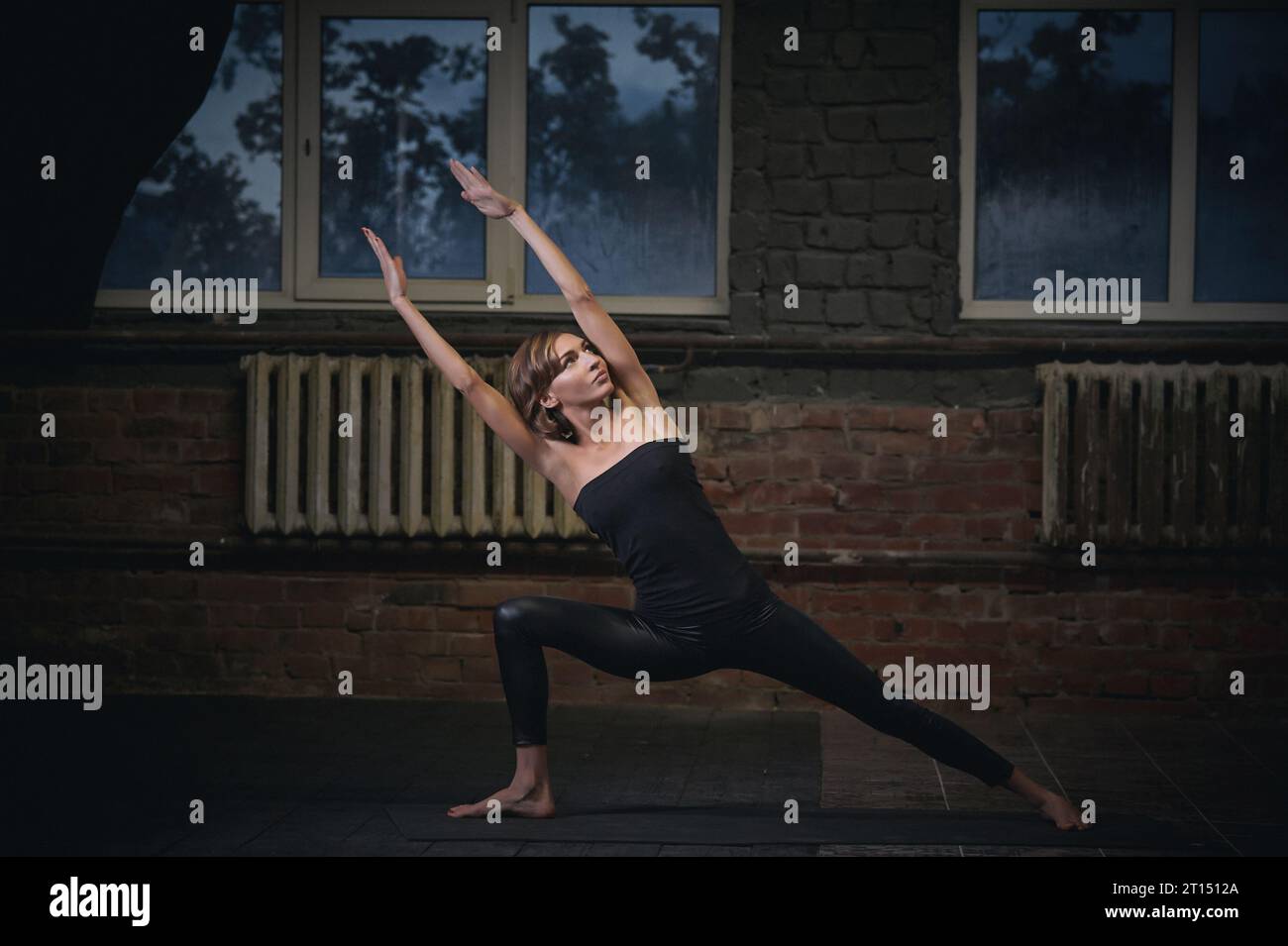 Beautiful sporty fit yogini woman practices yoga asana Utthita ...