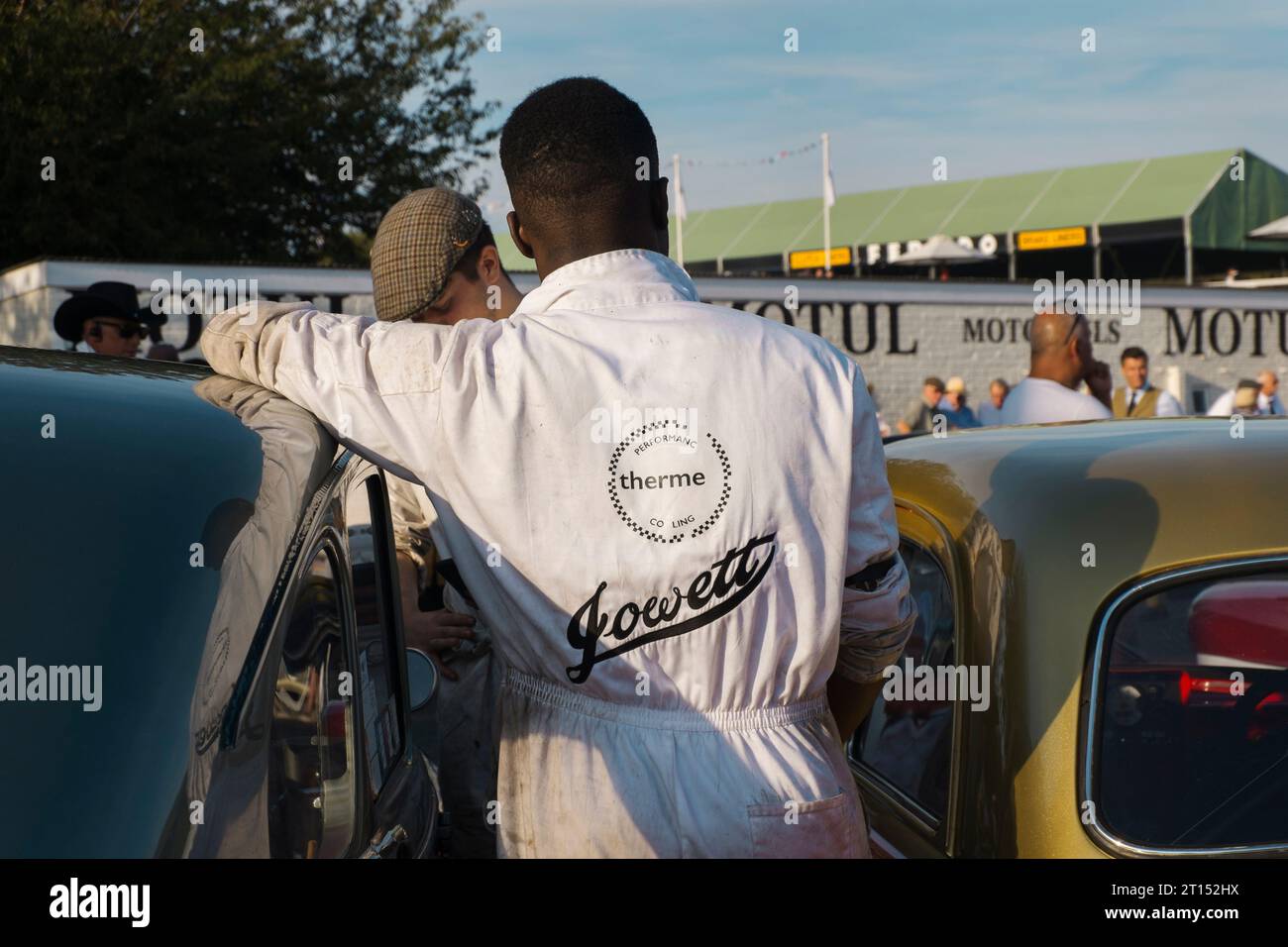 Young mechanic leaning on a 1953 Jowett Javelin before the St Mary's ...