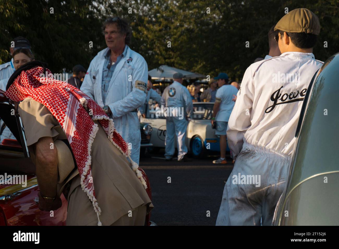 Mechanic next to a 1959 Jaguar Mk1 & 1953 Jowett Javelin in the St Mary ...