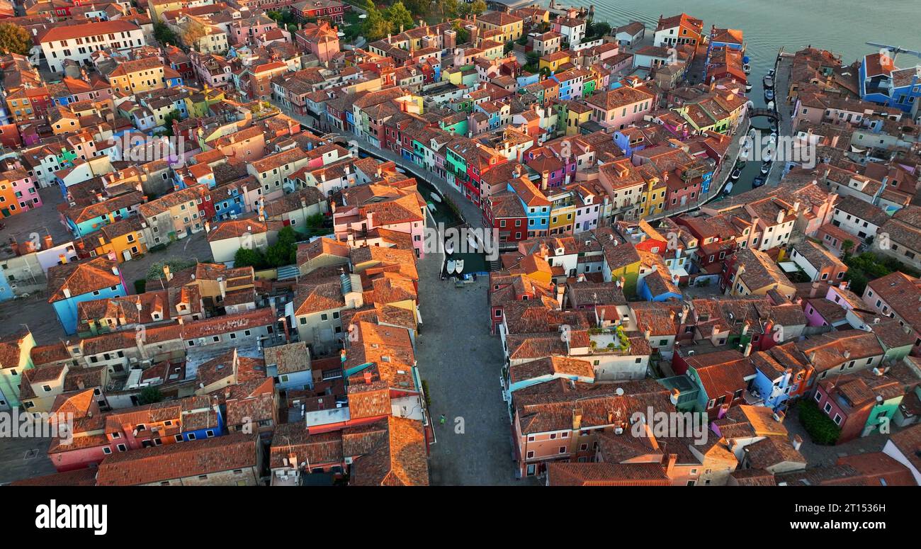 Aerial view of Burano colorful houses, along the Fondamenta embankment ...