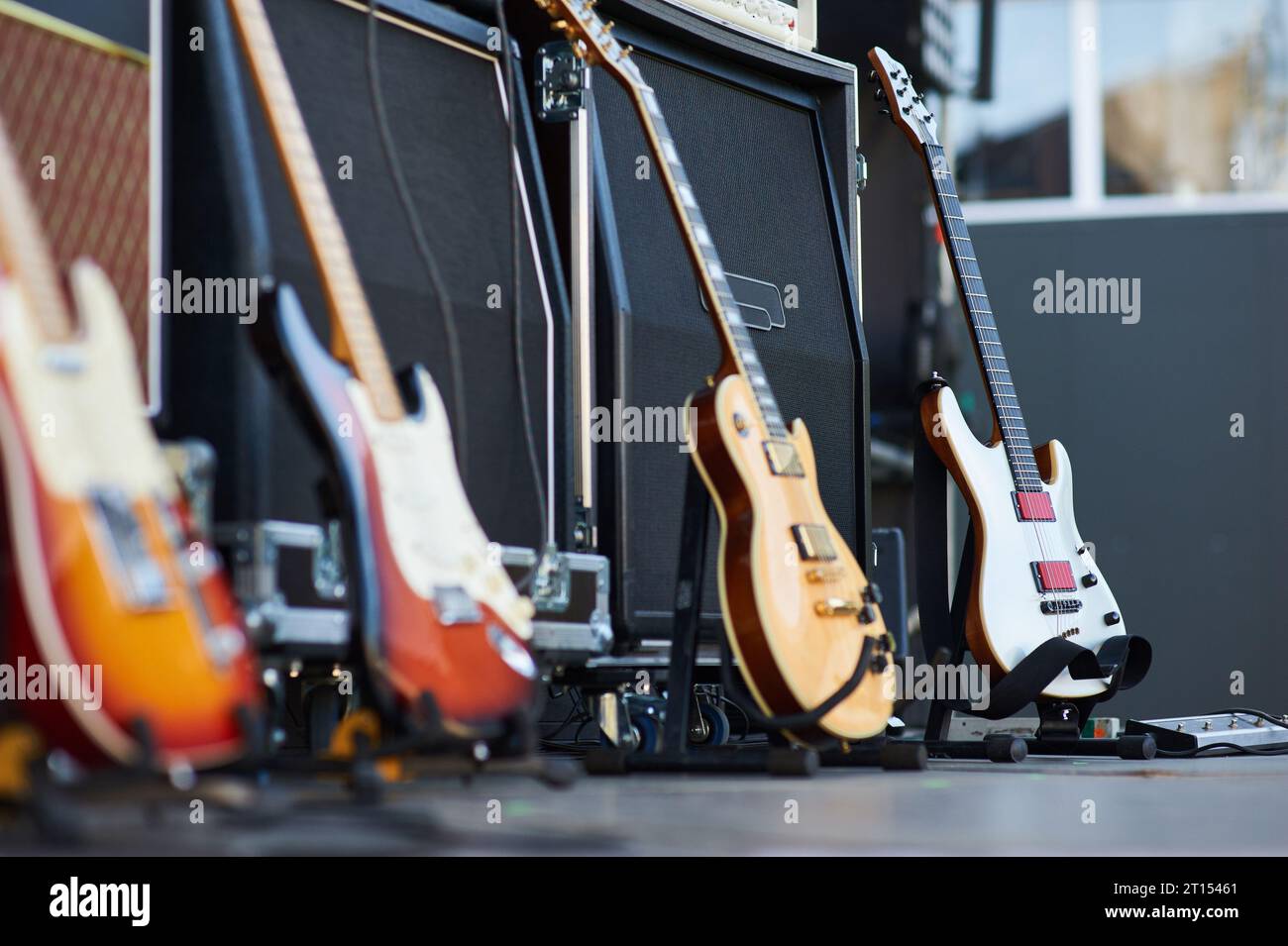 amplifier with electric guitar on the stage. music instrument set for ...