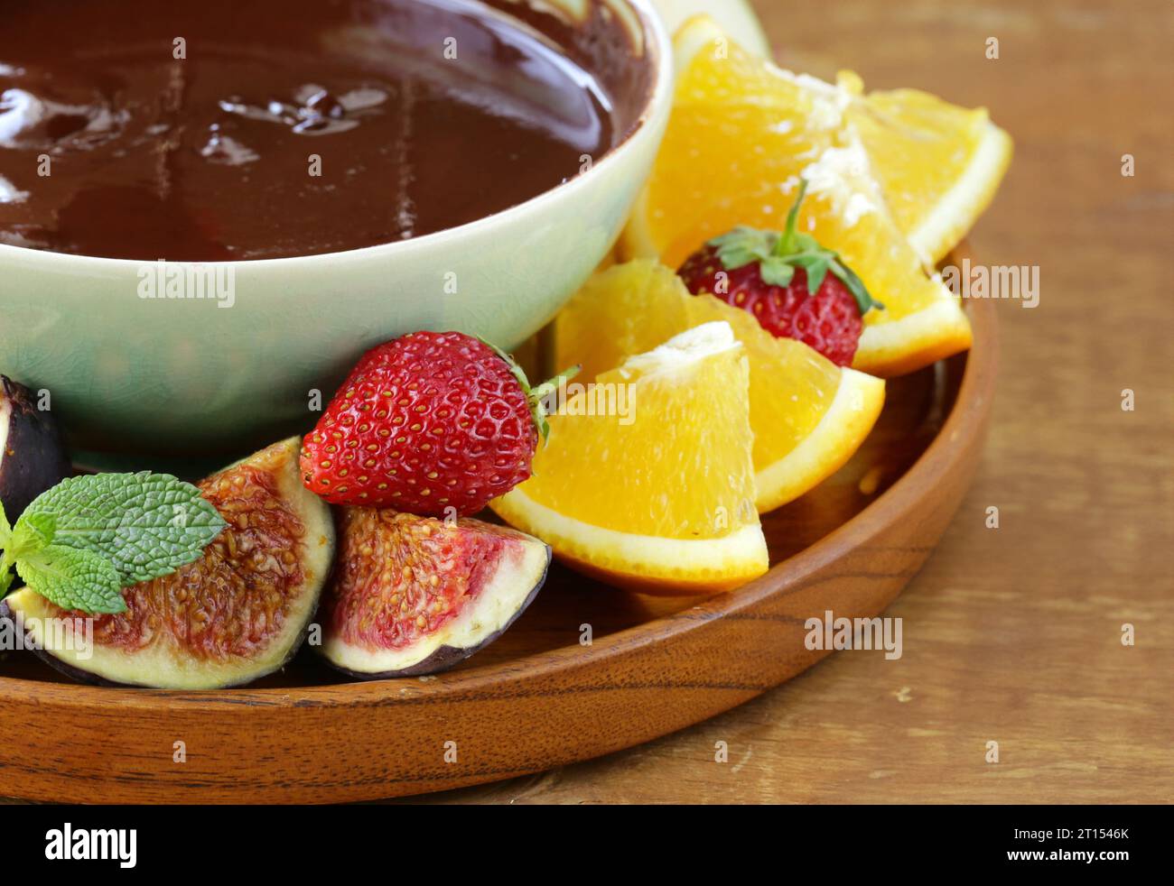chocolate fondue with fresh berries and fruits Stock Photo - Alamy