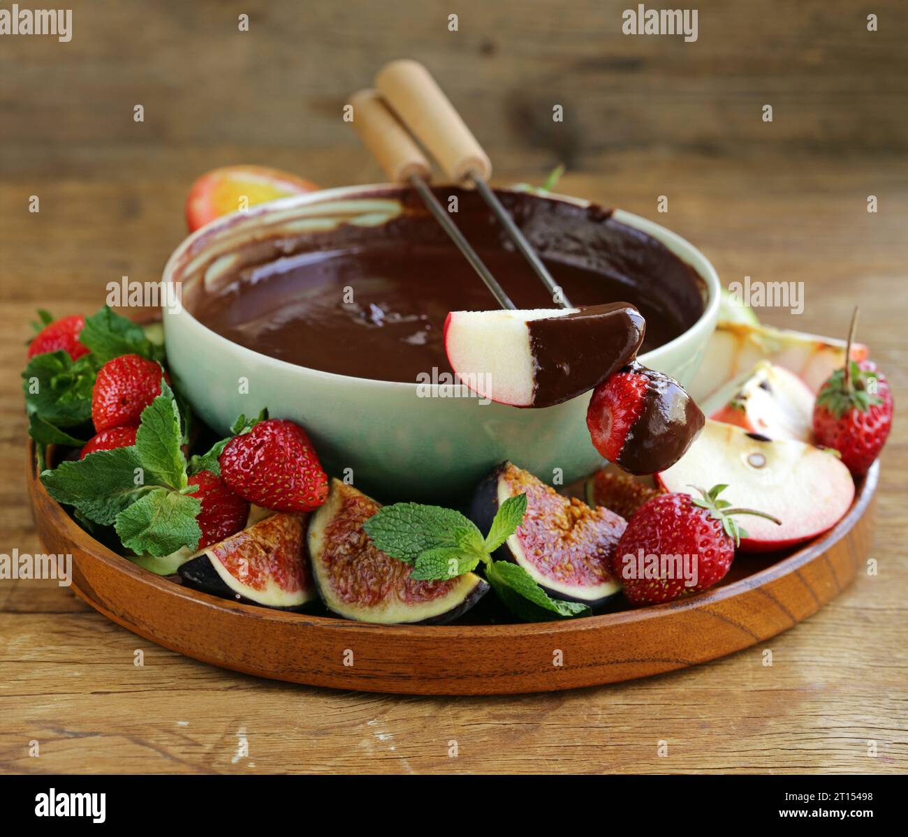 chocolate fondue with fresh berries and fruits Stock Photo - Alamy
