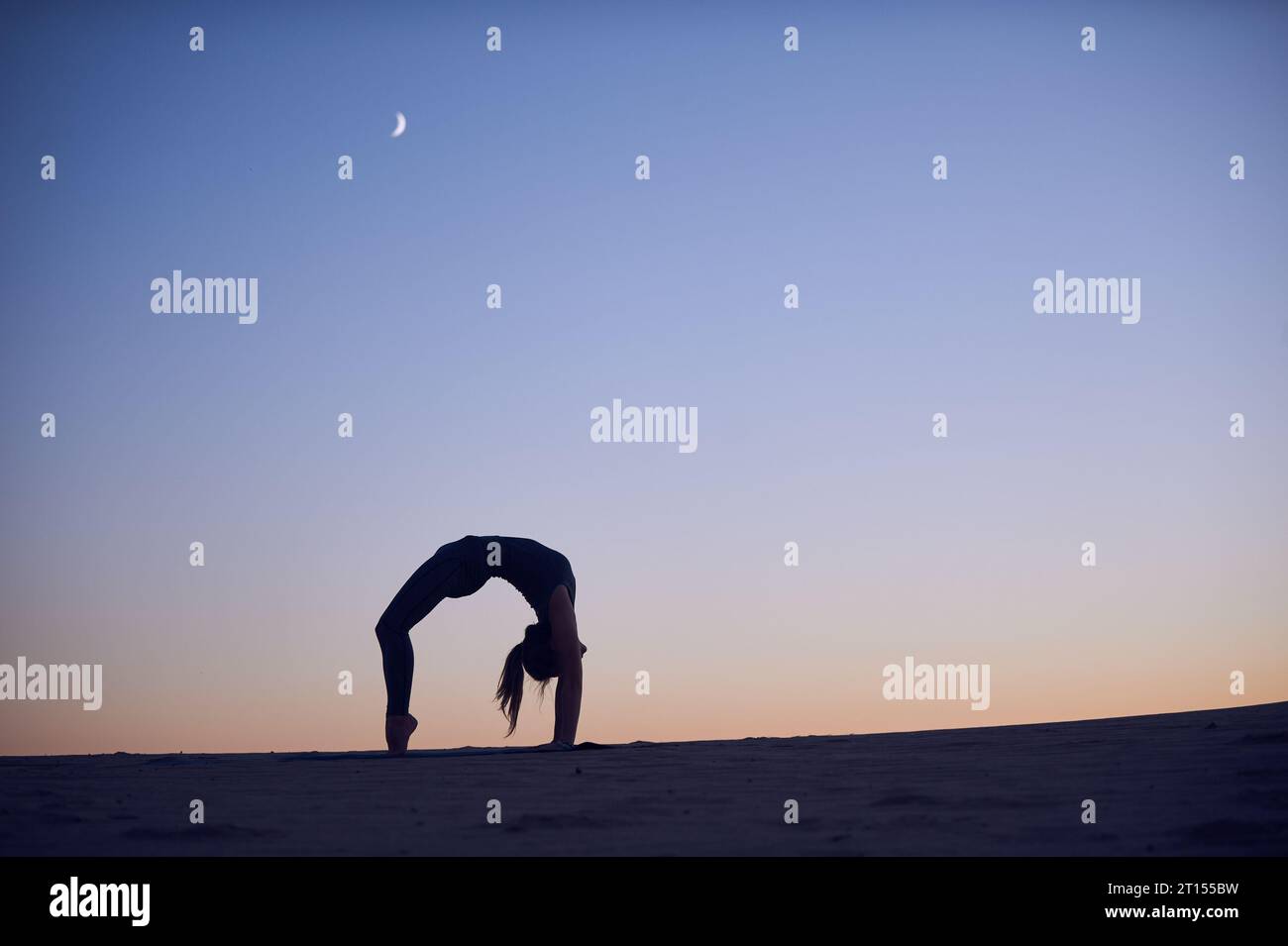 Beautiful Young Woman Practices Backbend Yoga Asana Urdhva Dhanurasana