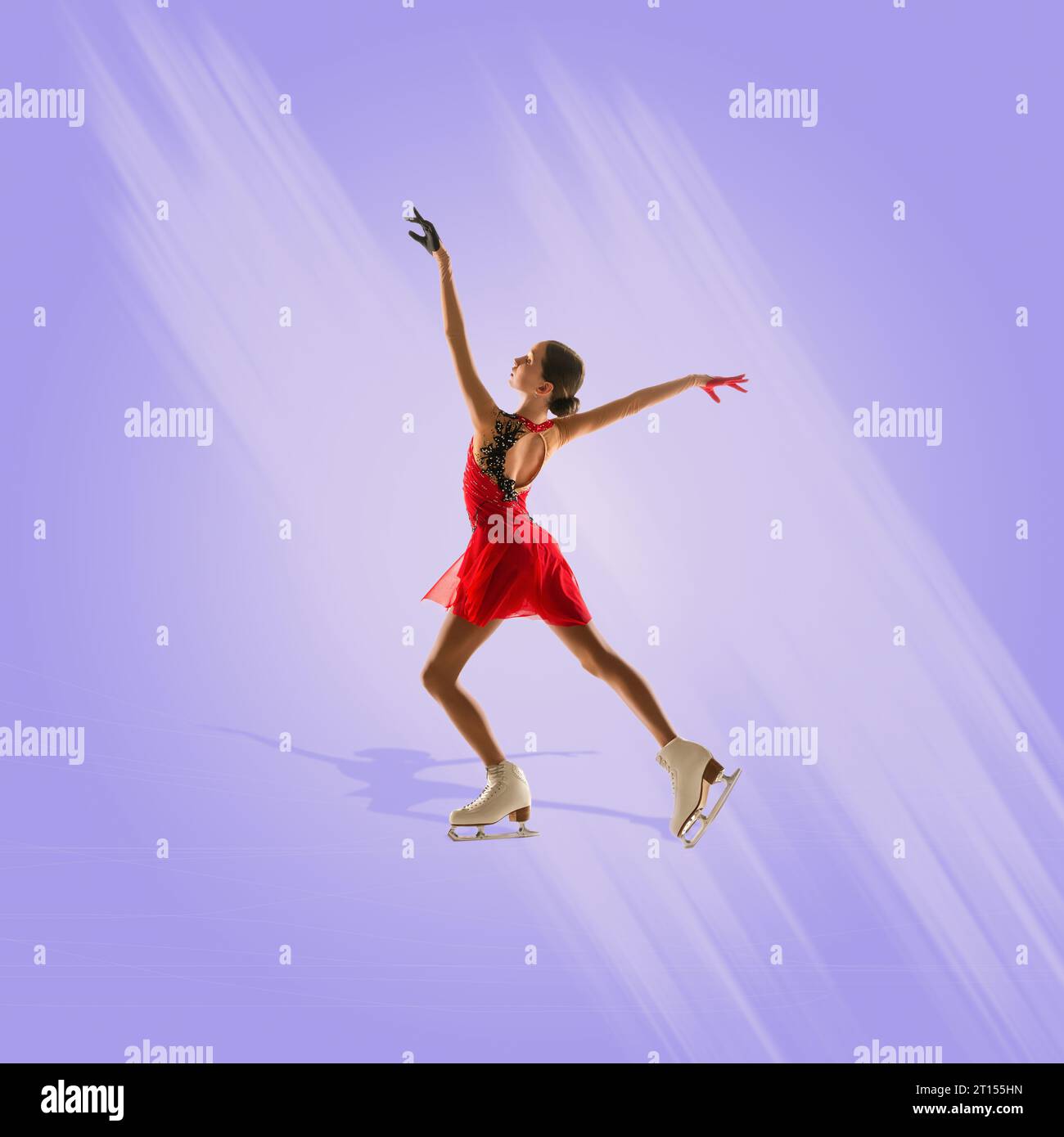 Elegant teen girl, beautiful dancer making performance. Figure skating ...