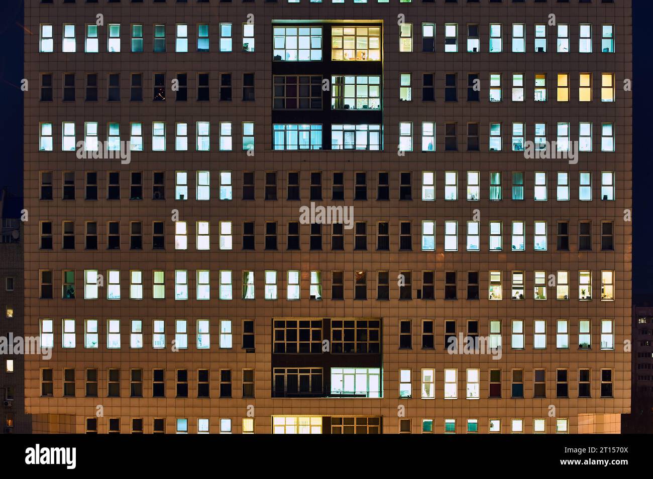 Modern office building at night close up Stock Photo - Alamy