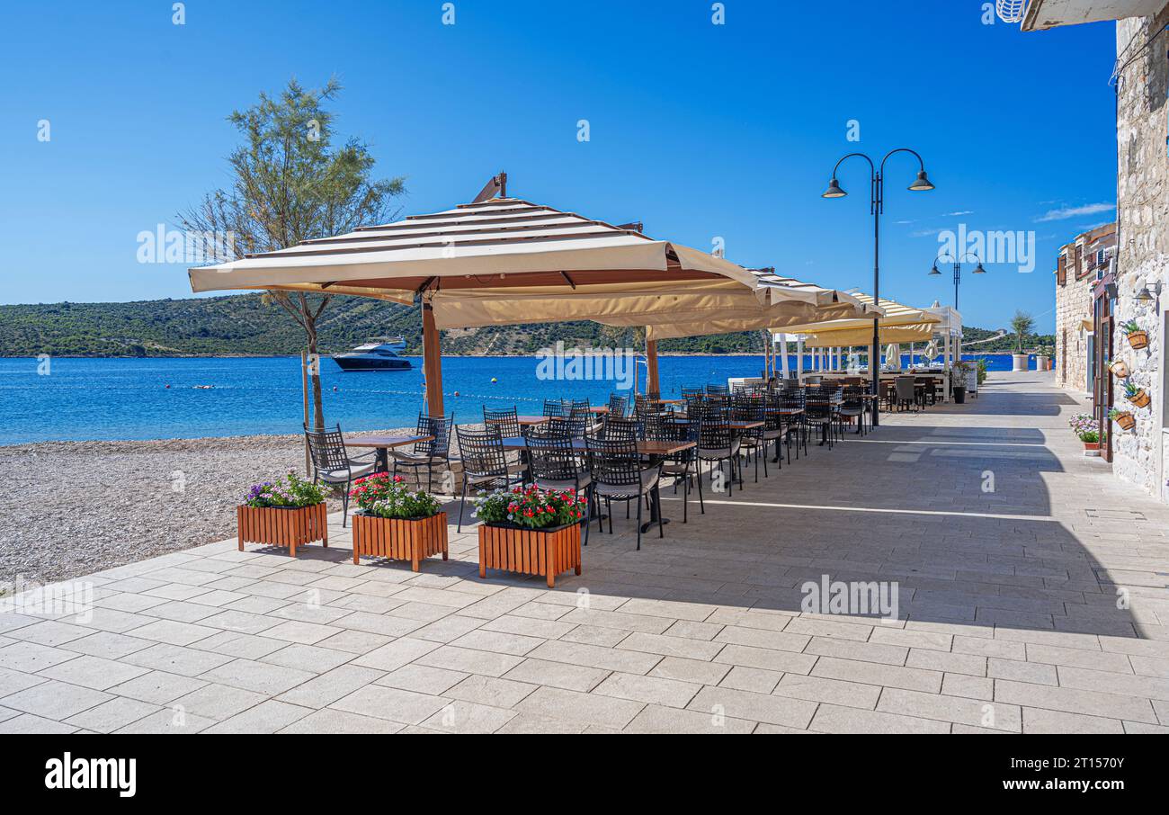 The interior of an open-air restaurant on the seashore Stock Photo - Alamy