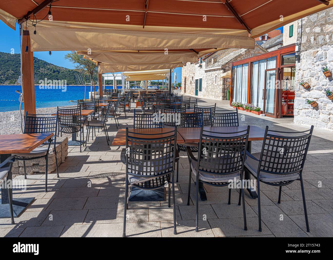 The interior of an open-air restaurant on the seashore Stock Photo - Alamy