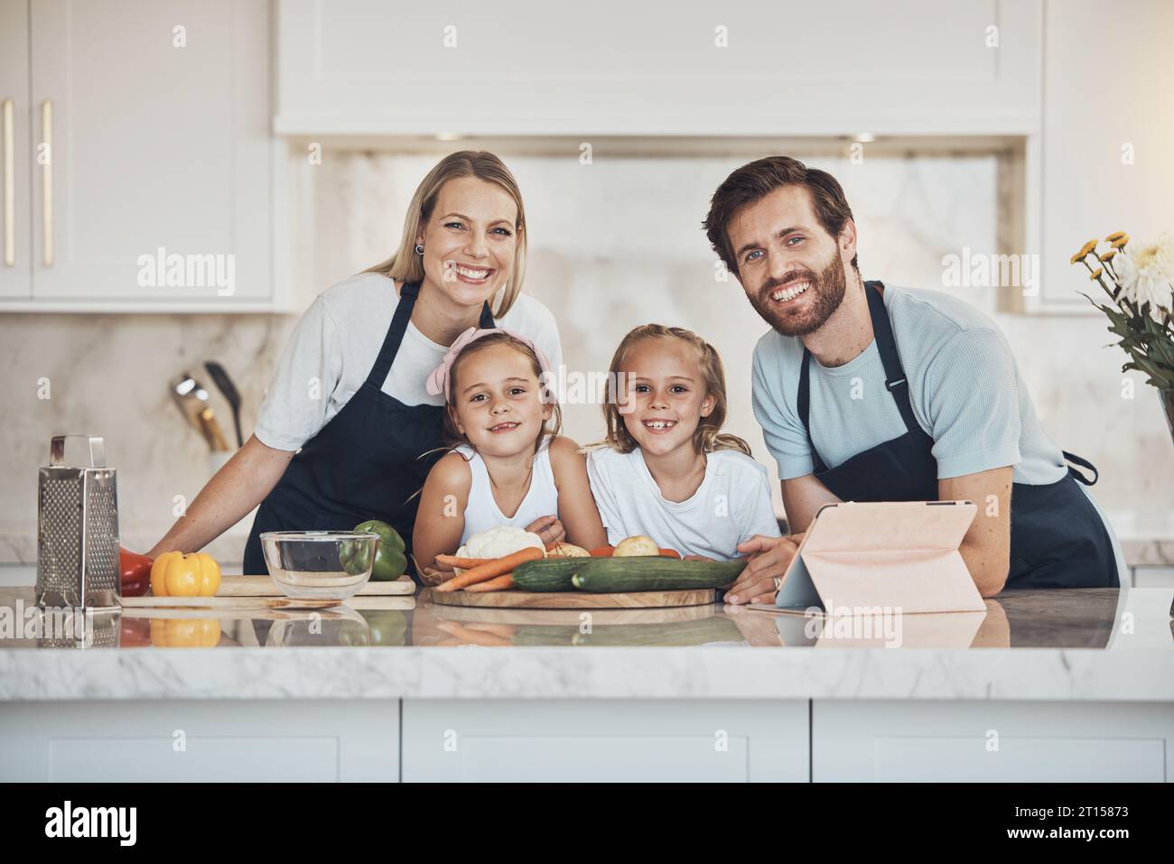 Smile, portrait and family cooking in kitchen together for bonding and ...
