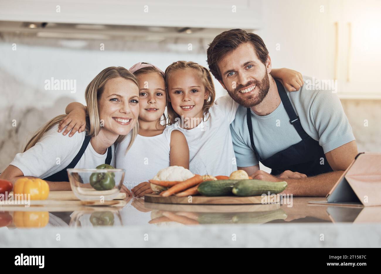 Love, portrait and family cooking in kitchen together for bonding and ...