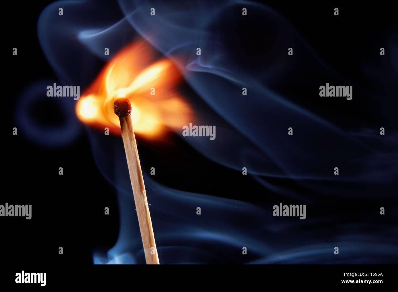 burning match with smoke on black background close up Stock Photo - Alamy