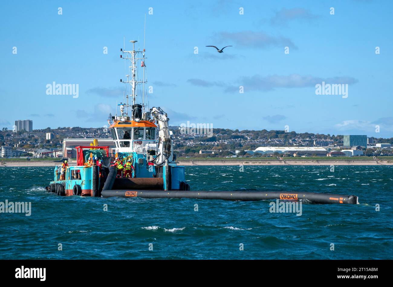 Crew onboard the Jif Worker, a multi-cat vessel, deploy a heavy duty ...