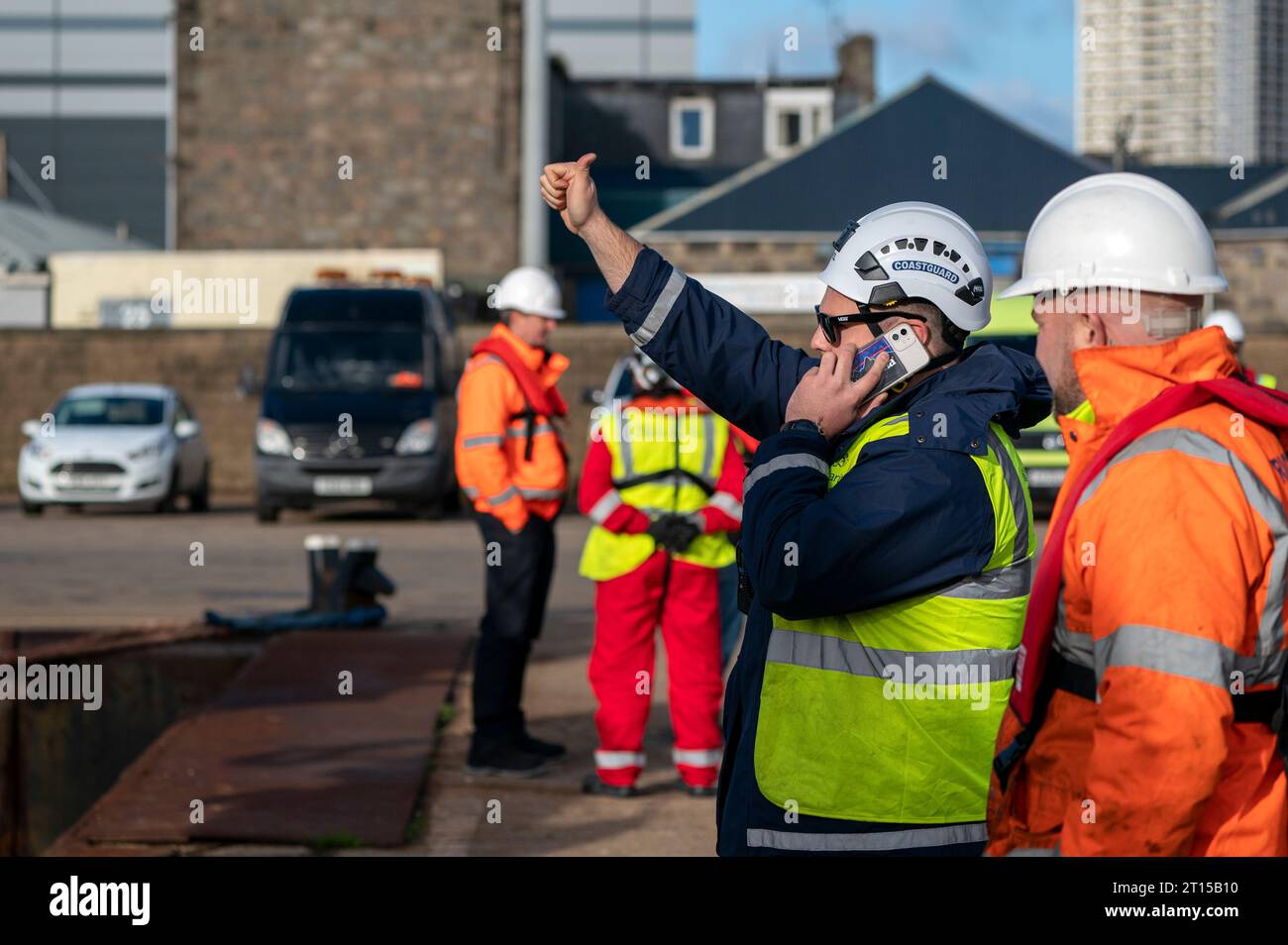 Members of the Maritime and Coastguard Agency (MCA) prepare to take ...