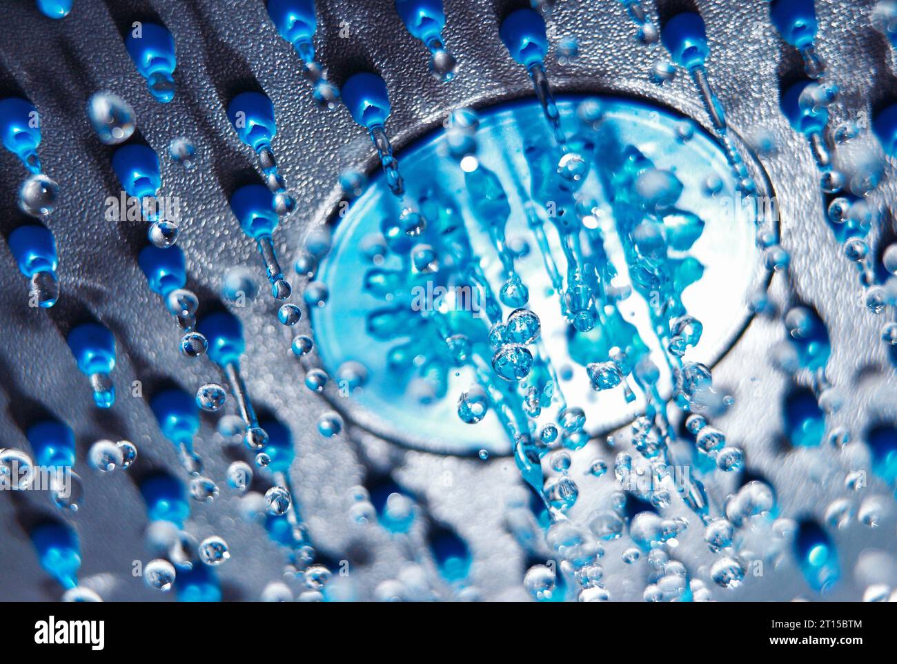 shower head with flowing drops and streams of water Stock Photo - Alamy