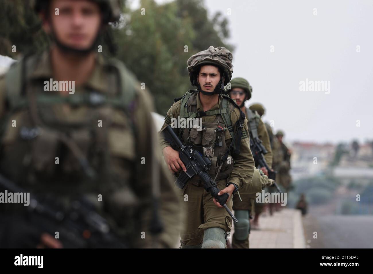 11 October 2023, Israel, Sderot: Israeli officers secure the area as ...