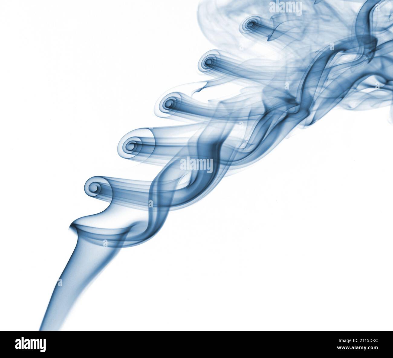 Blue abstract smoke from the aromatic sticks on a white background ...