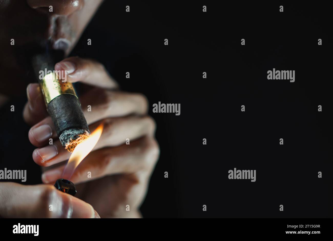 Burning cigarette in old hi-res stock photography and images - Alamy