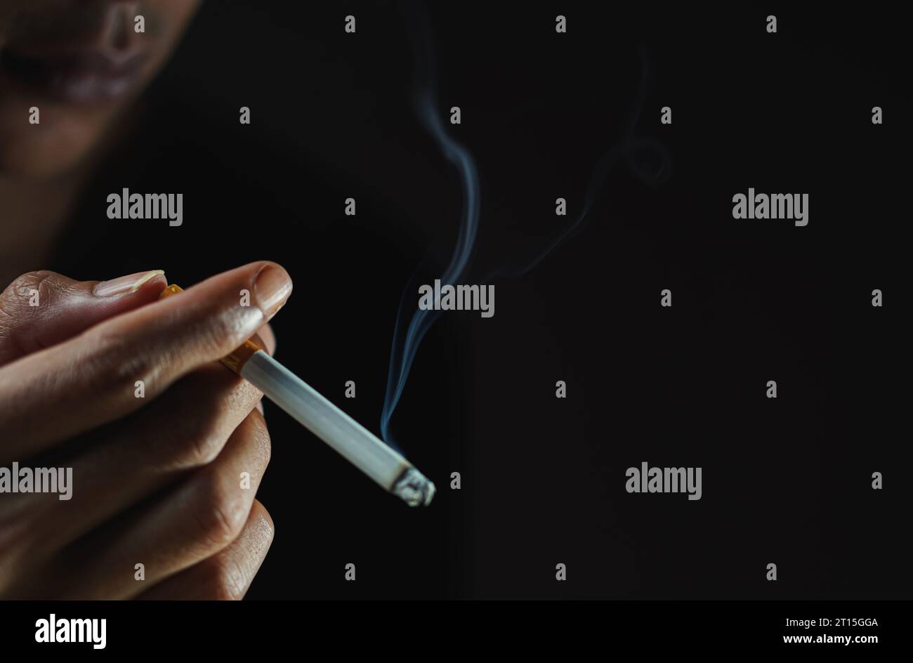 Sad young man cigarette hi-res stock photography and images - Alamy