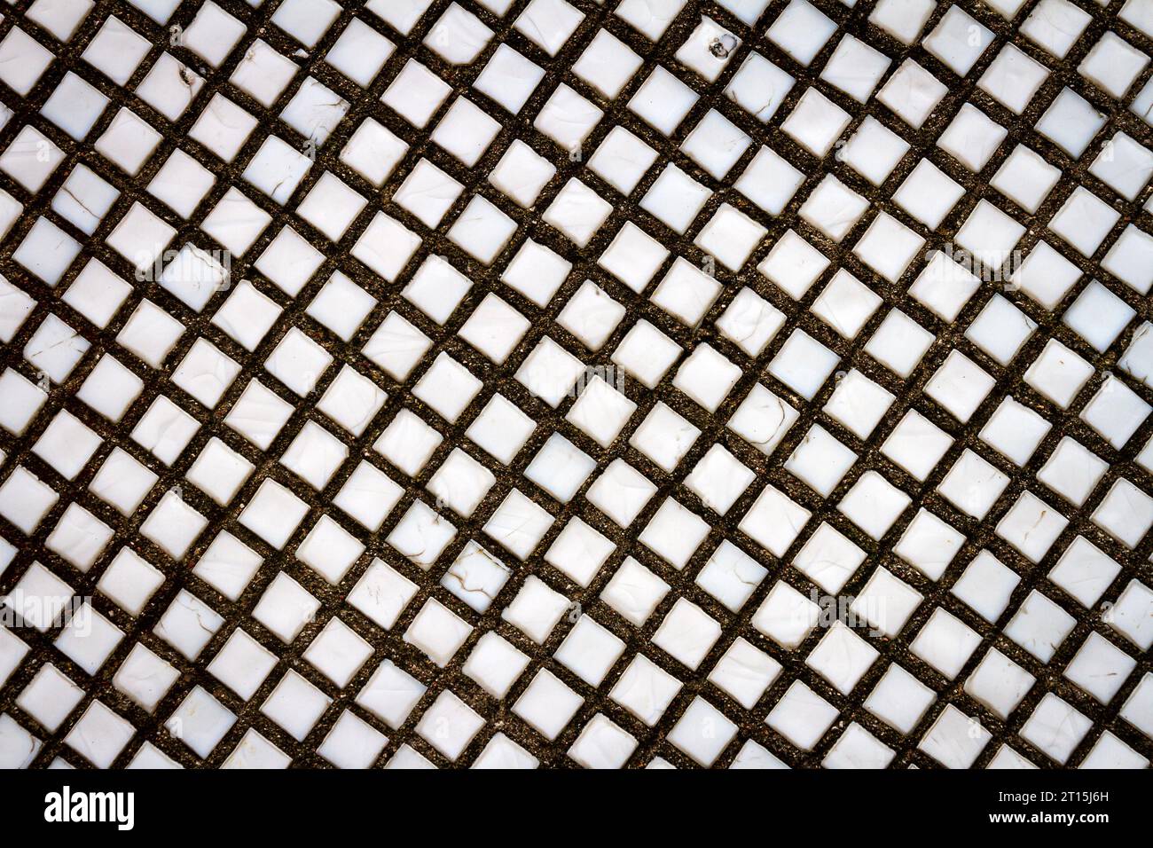 Texture of the old tile wall. Square white small tiles on concrete ...