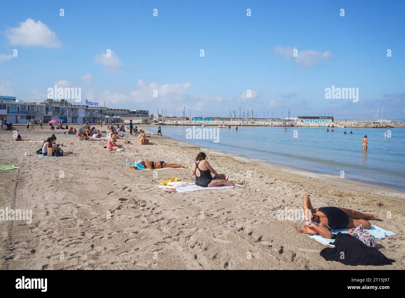 Marseilles, France. 11 October 2023. Beachgoers relaxing in the warm ...