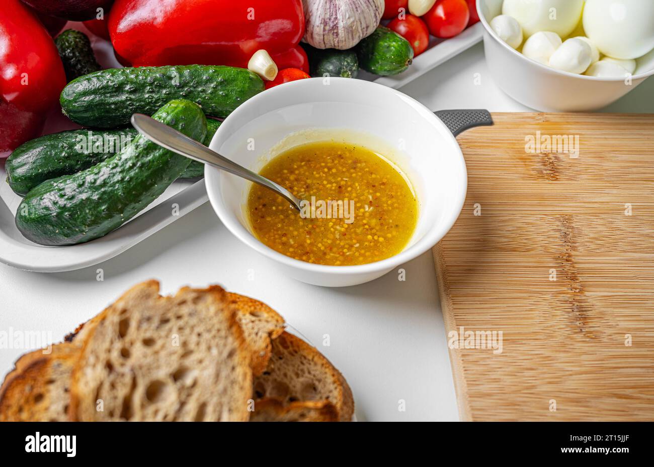 Dressing sauce for vegetable salad Stock Photo - Alamy